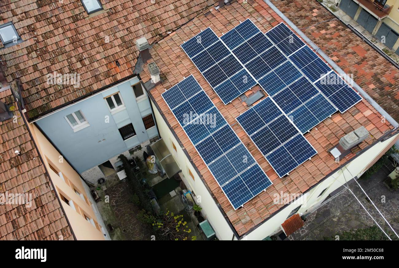 Aerial top down view of solar panels modules mounted on roof. Solar ...