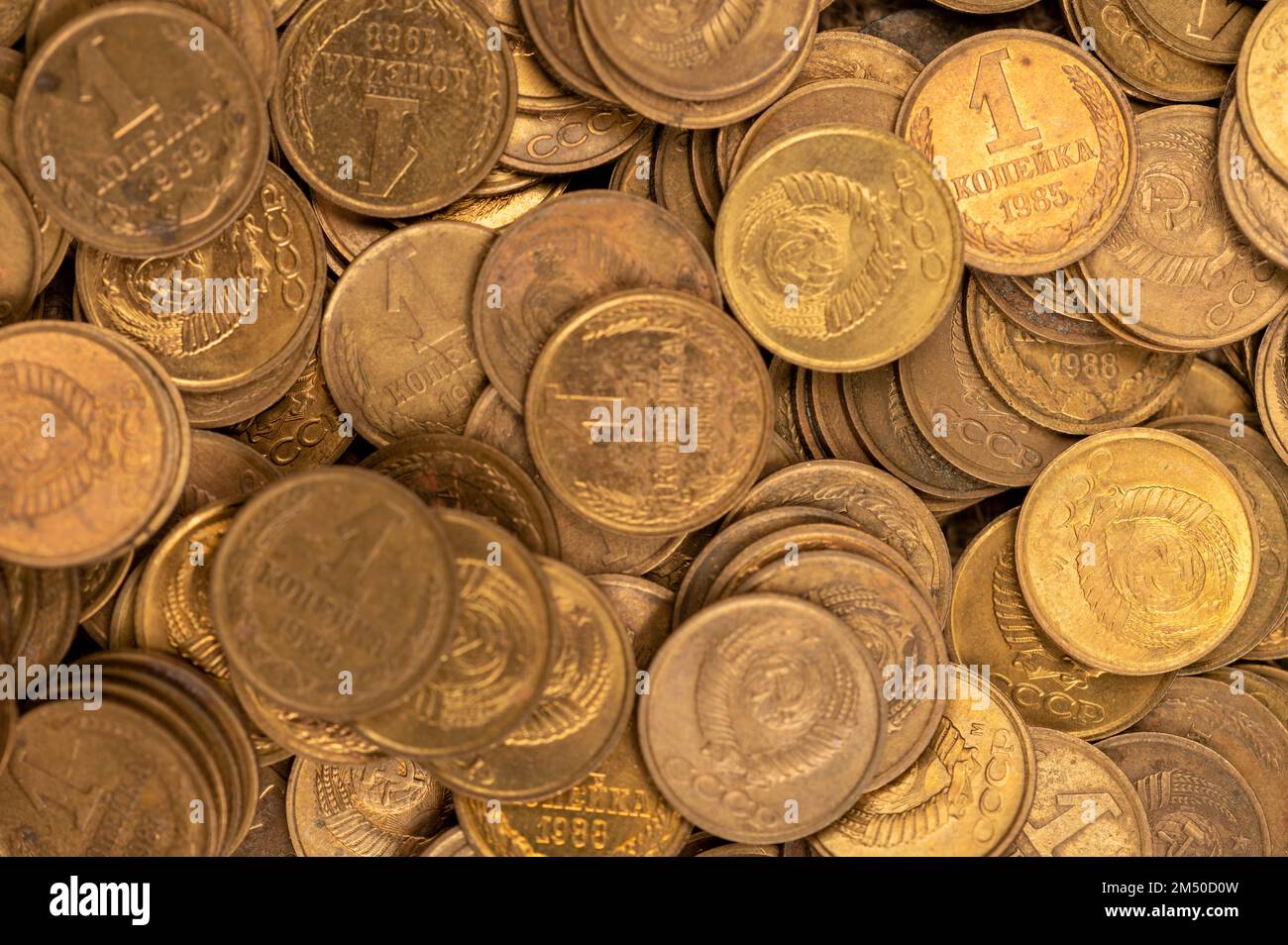 Old coins of the USSR in bulk on a flat surface, background image ...