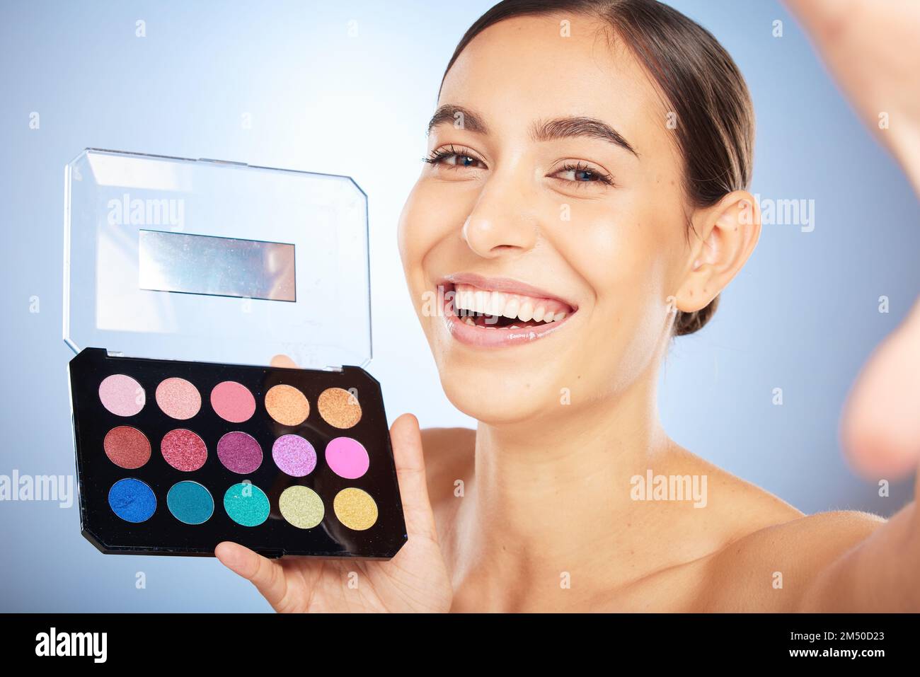 Face selfie, beauty and woman with makeup kit in studio isolated on ...