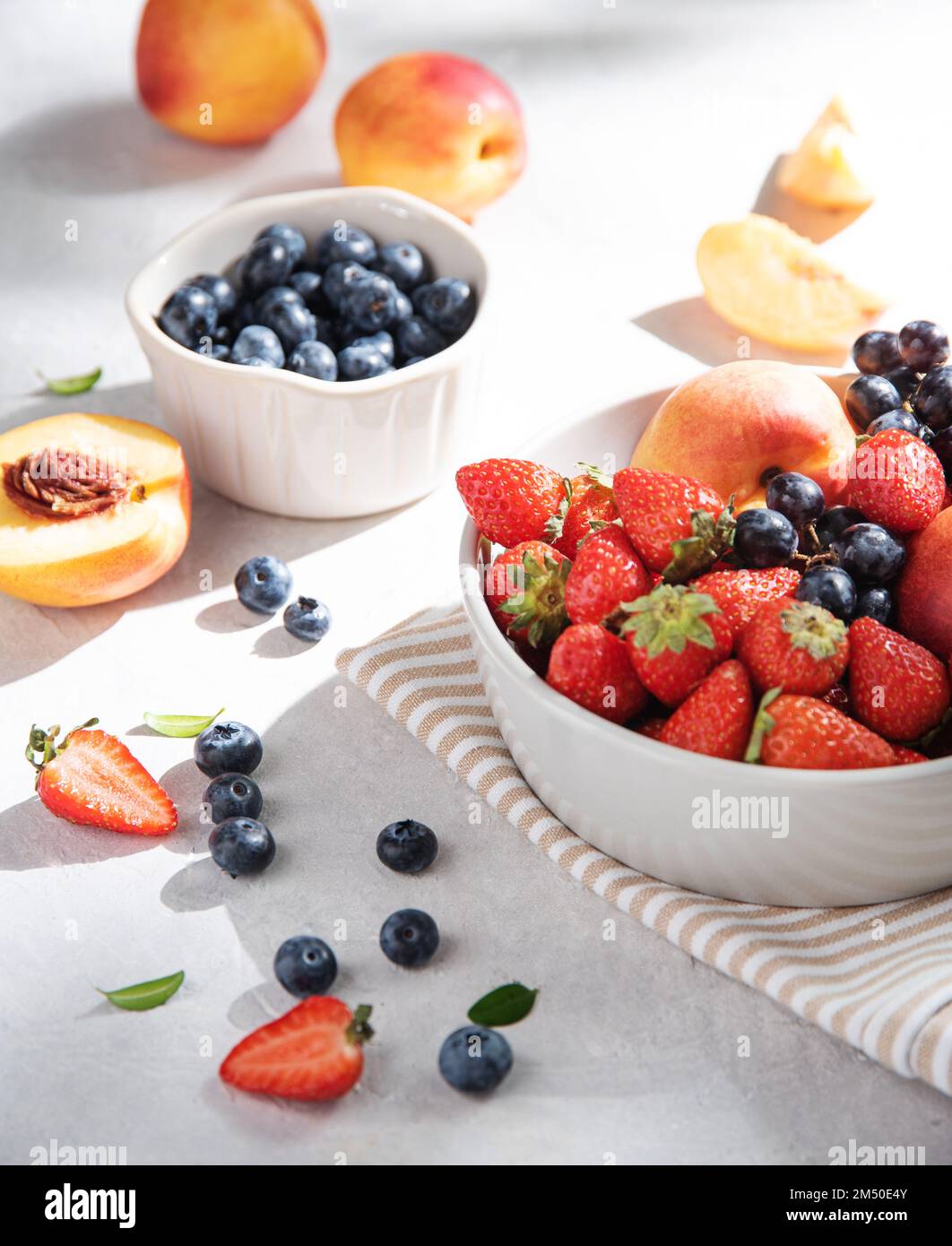 Fresh organic summer berries and fruits of strawberries, blueberries ...