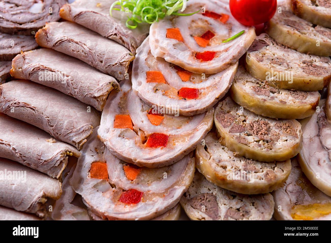 Sliced roast meat and meat rolls in assortment, close-up Stock Photo ...