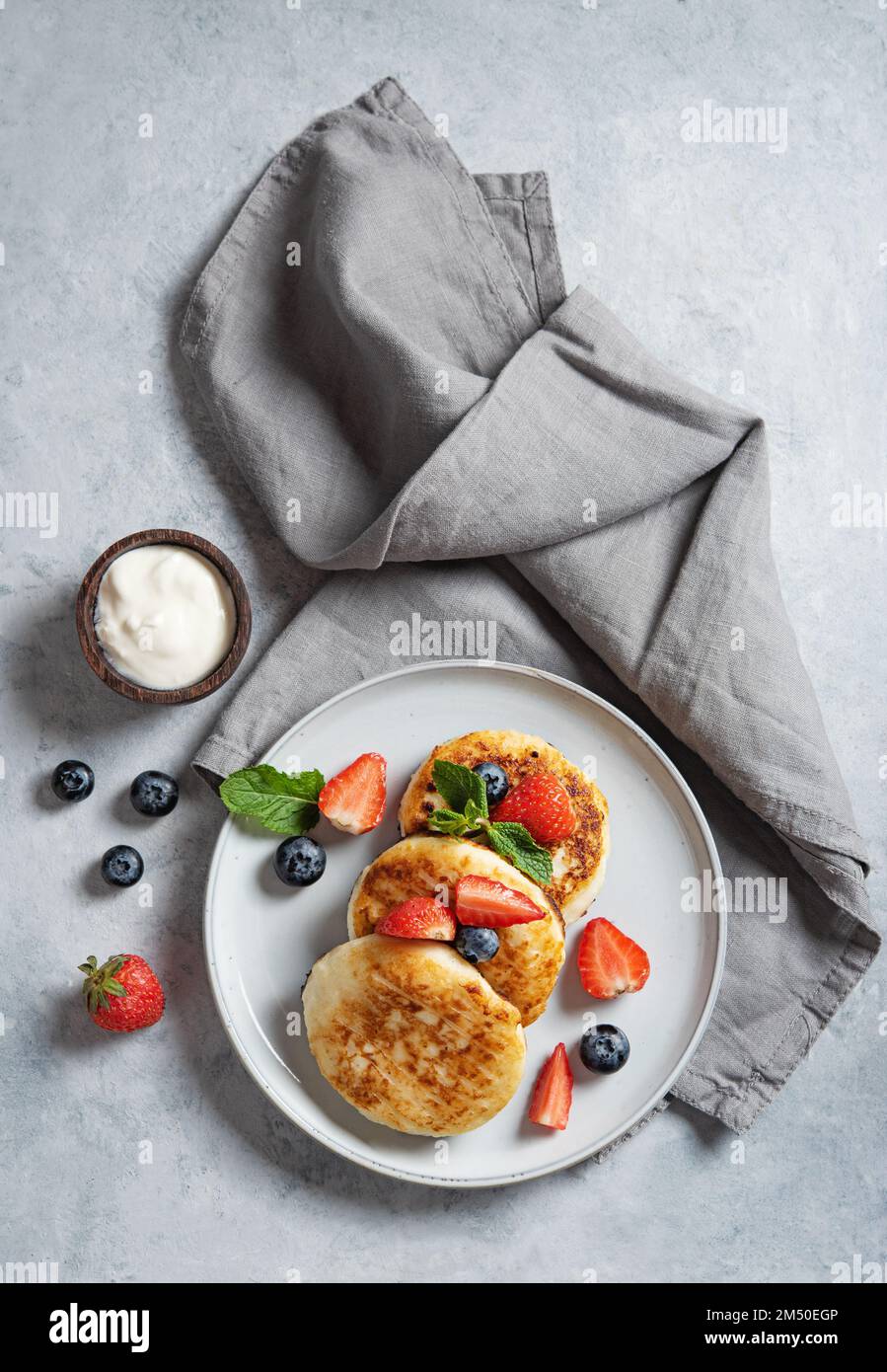 Traditional Russian dish for breakfast syrniki. Cottage cheese pancakes ...