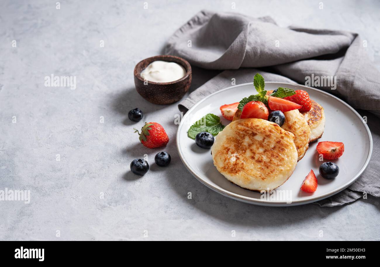 Traditional Russian dish for breakfast syrniki. Cottage cheese pancakes ...