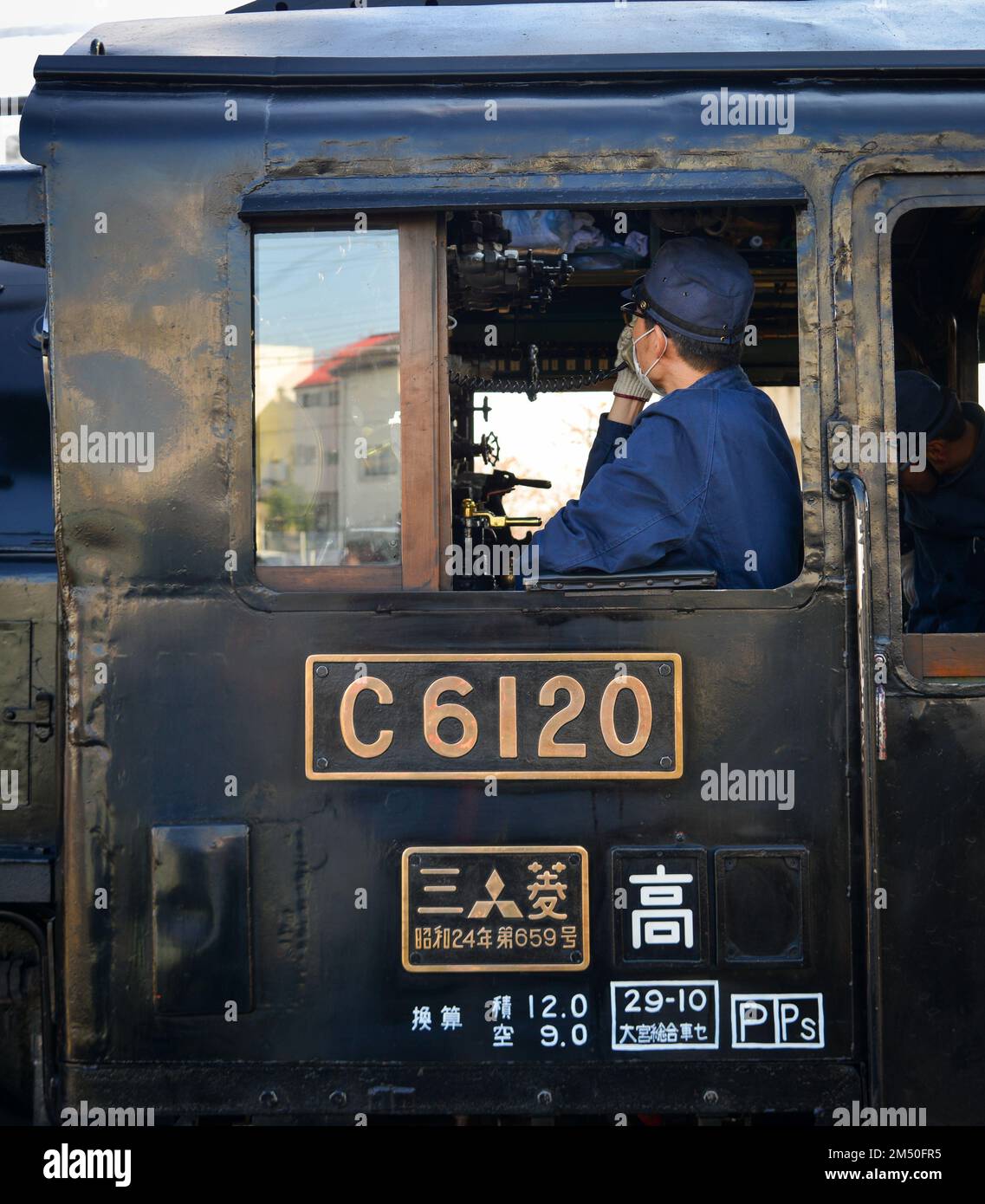 Gunma, Japan - Nov 9, 2019. A driver on vintage train in Gunma, Japan ...