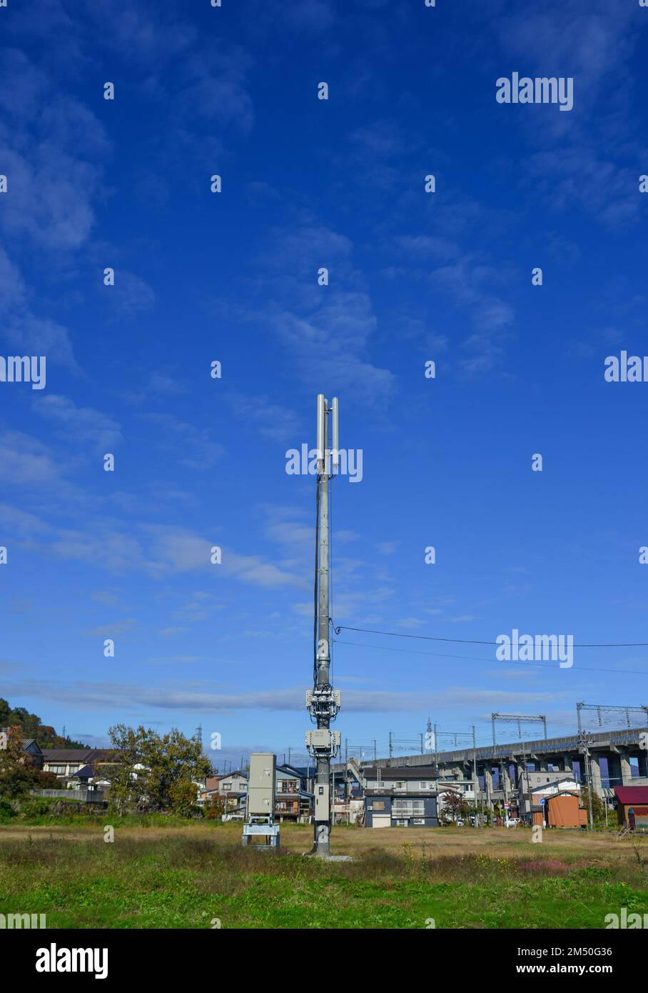 Telecommunications tower under a blue sky in Gunma, Japan Stock Photo ...
