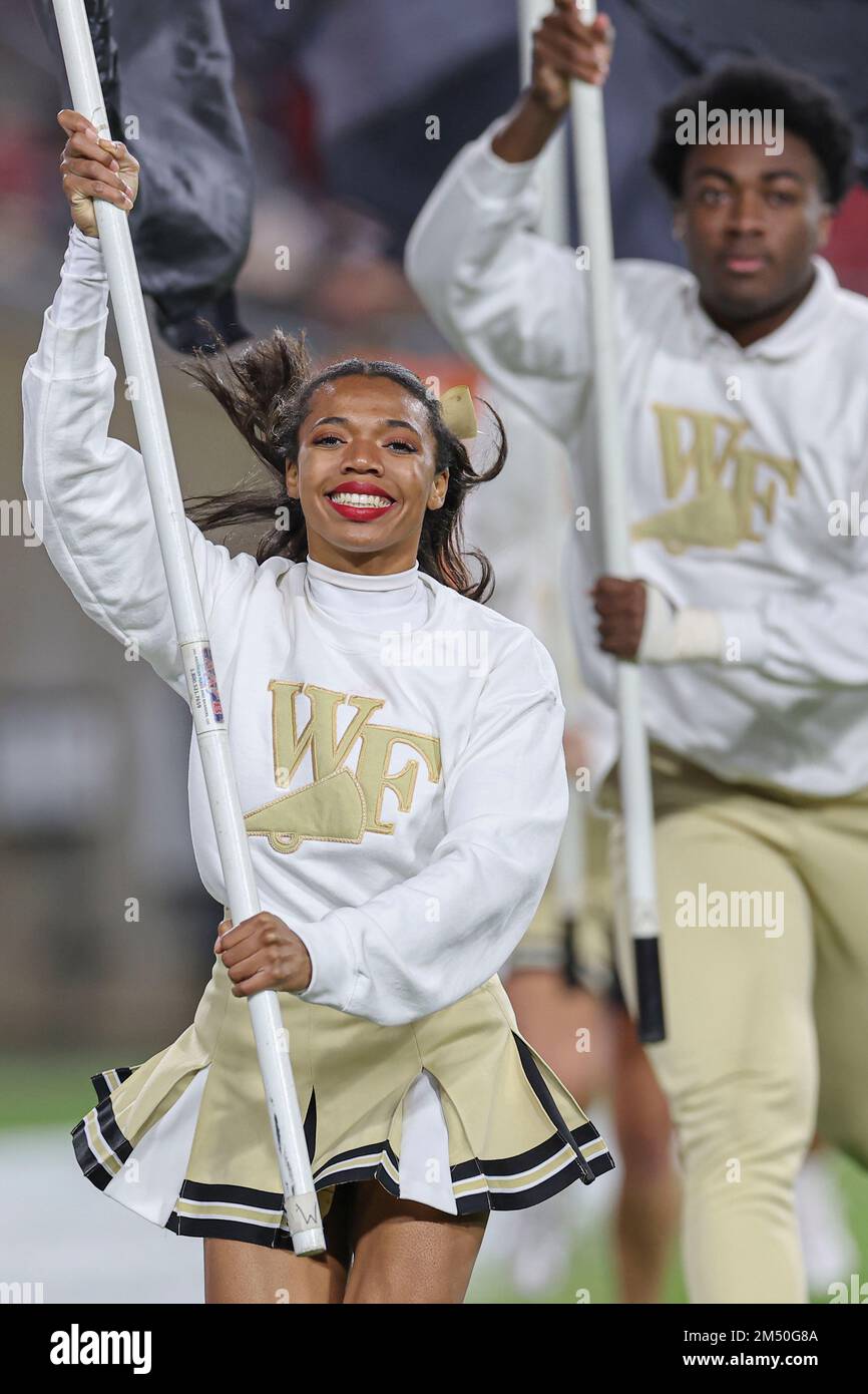 Tampa Bay, FL USA; Wake Forest Demon Deacons cheerleaders run with the ...