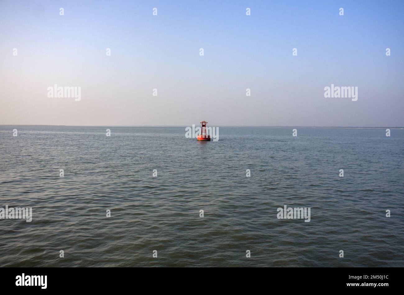Floating pillars indicating the river course Stock Photo - Alamy
