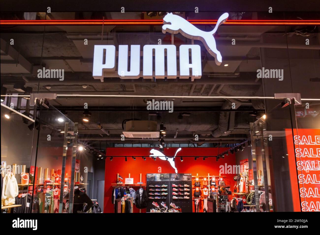 Close up PUMA's shop sign above entrance to store. German sports brand ...