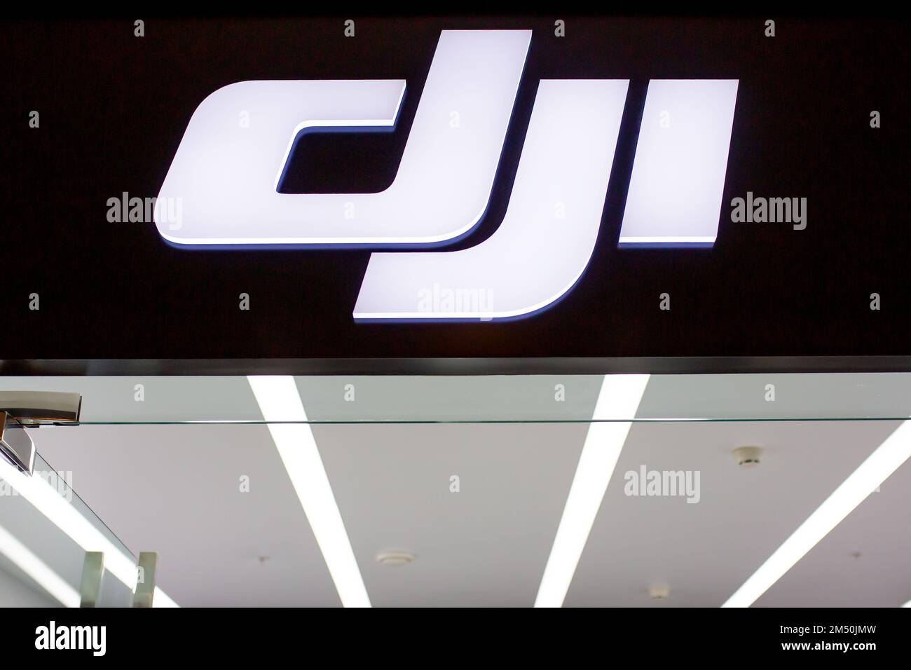 The DJI logo at a DJI store. DJI is a Chinese technology company known ...