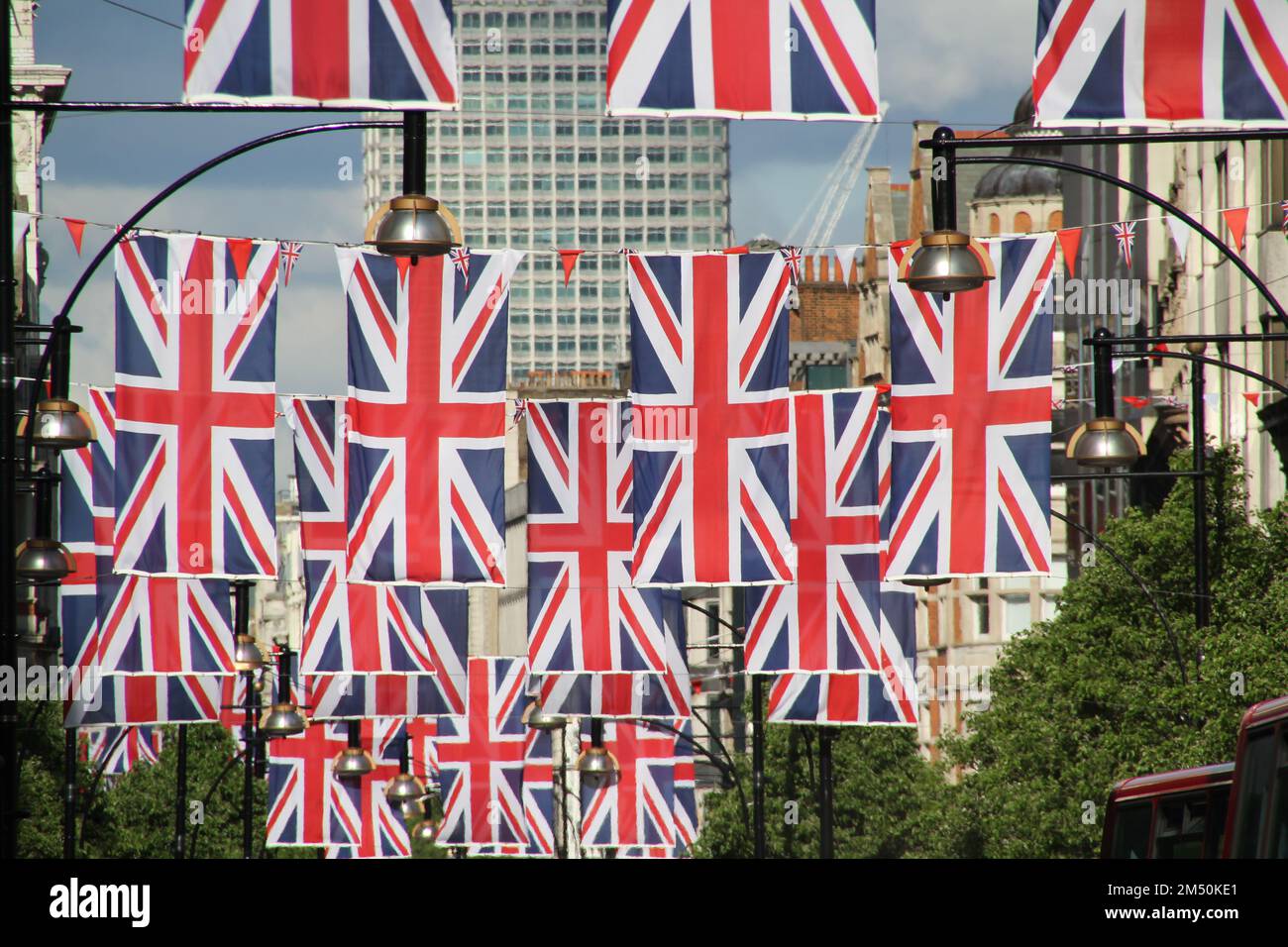 A bunch of Union Jack banners hanging across the streets Stock Photo ...