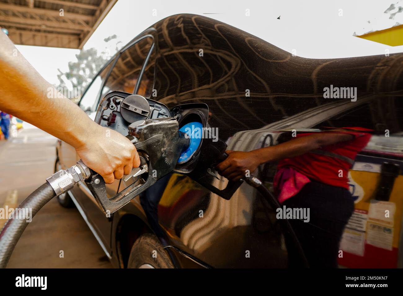 September 10, 2022, Brazil. Filling up the car with fuel at a gas ...