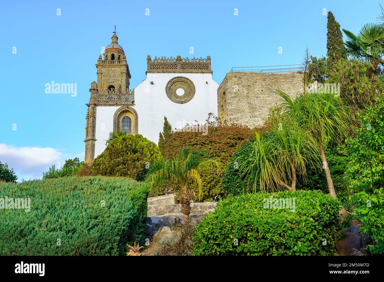 Medival church of stone and white walls of the picturesque town of ...