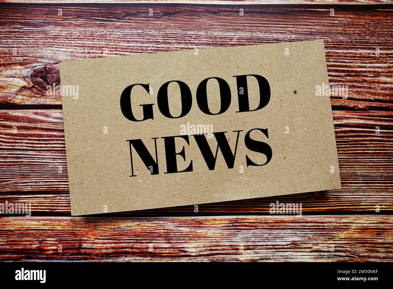 Good news written on paper card top view of wooden background Stock ...
