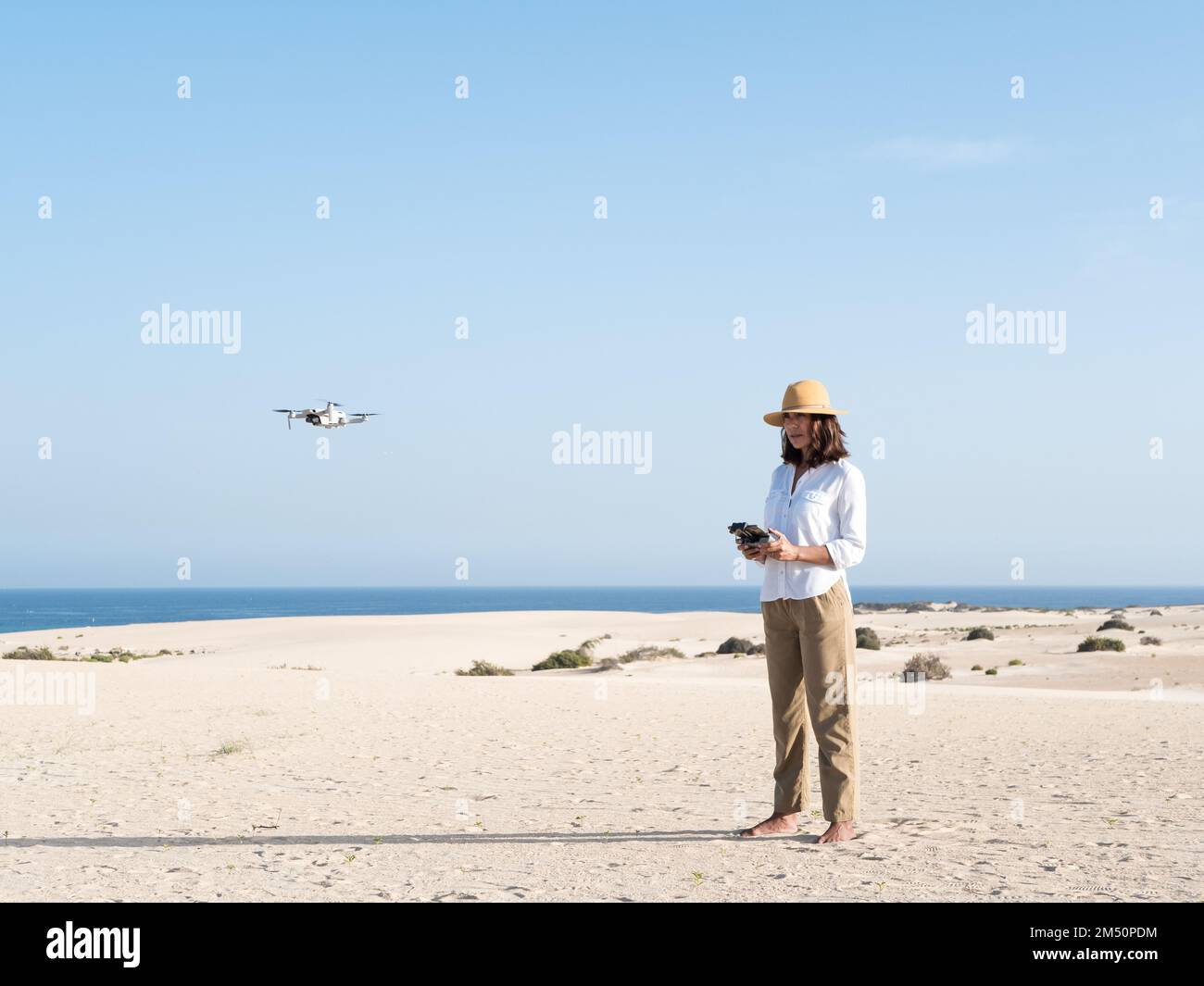 Female drone pilot hi-res stock photography and images - Alamy