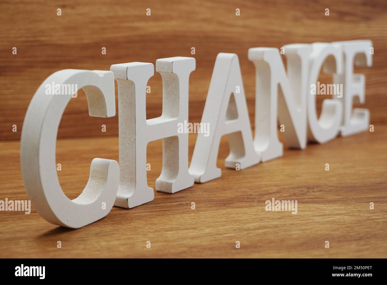 Chance word alphabet letters on wooden background Stock Photo - Alamy