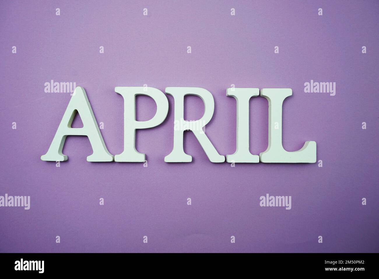 April alphabet letter with space copy on Purple background Stock Photo ...