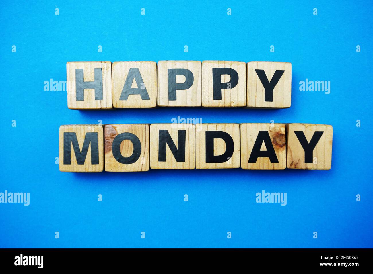 Happy Monday text alphabet letter on blue background Stock Photo - Alamy