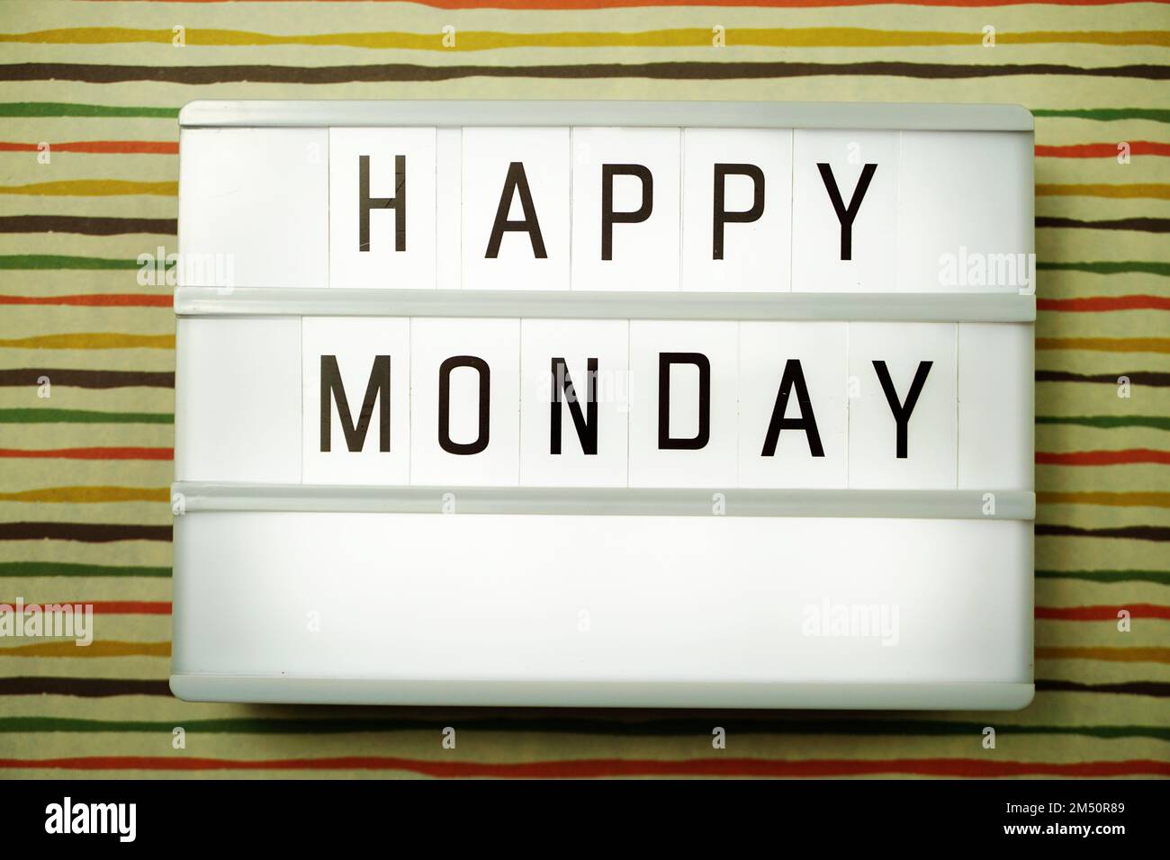 Top view Happy Monday Text in Light box flat lay Stock Photo - Alamy
