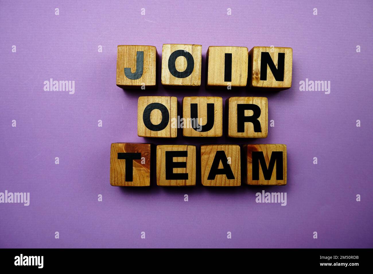 Top view Join our team alphabet letters on purple background Stock ...