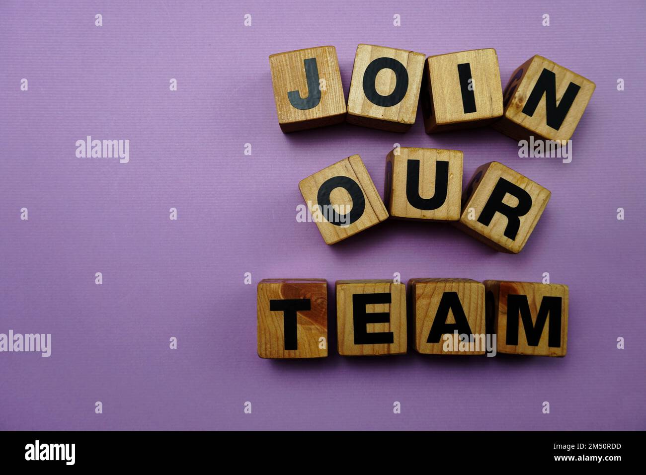 Top view Join our team alphabet letters on purple background Stock ...