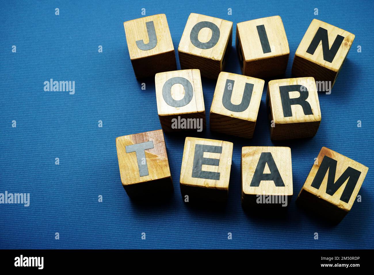 Top view Join our team alphabet letters on navy blue background Stock ...