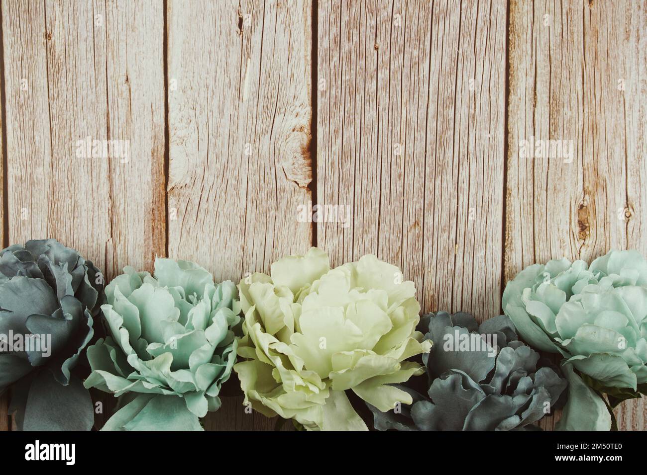 Blue Peony flower border frame on wooden background Stock Photo - Alamy