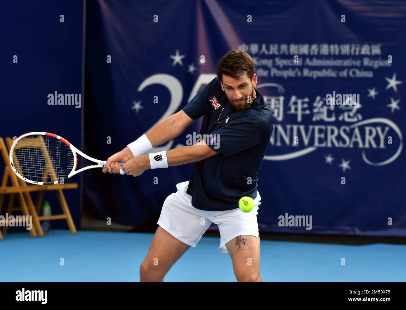 Hong Kong, China. 24th Dec, 2022. Cameron Norrie of Britain hits a ...