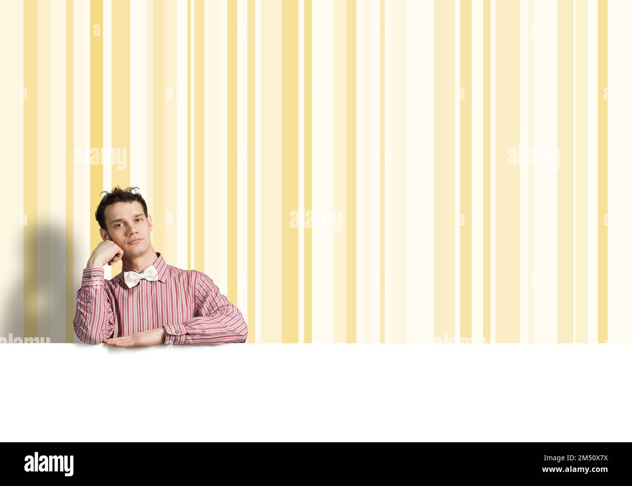 Bored man with banner Stock Photo - Alamy