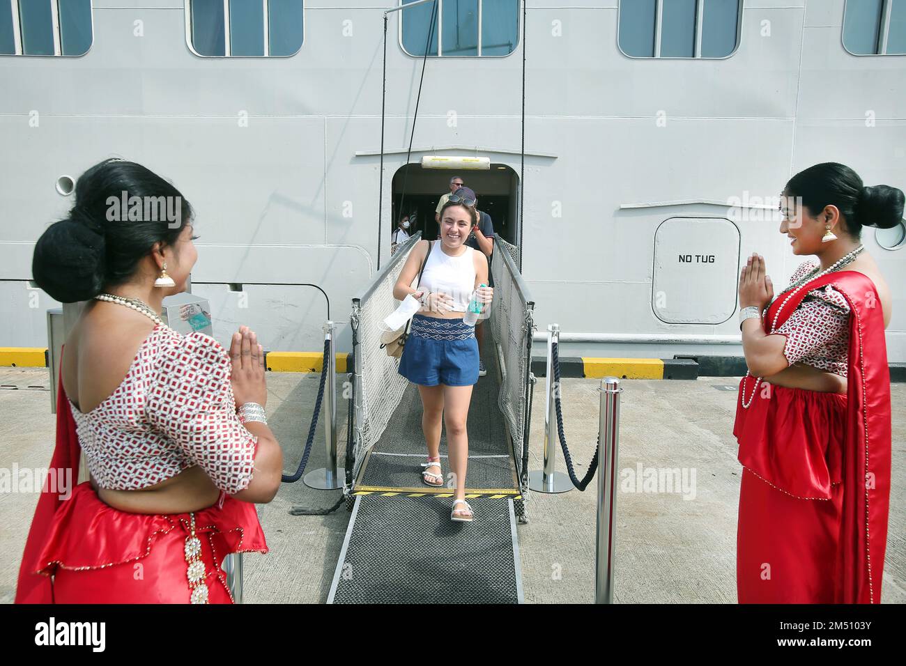 Colombo, Sri Lanka. 23rd Dec, 2022. Tourists walk out of a cruise ship ...