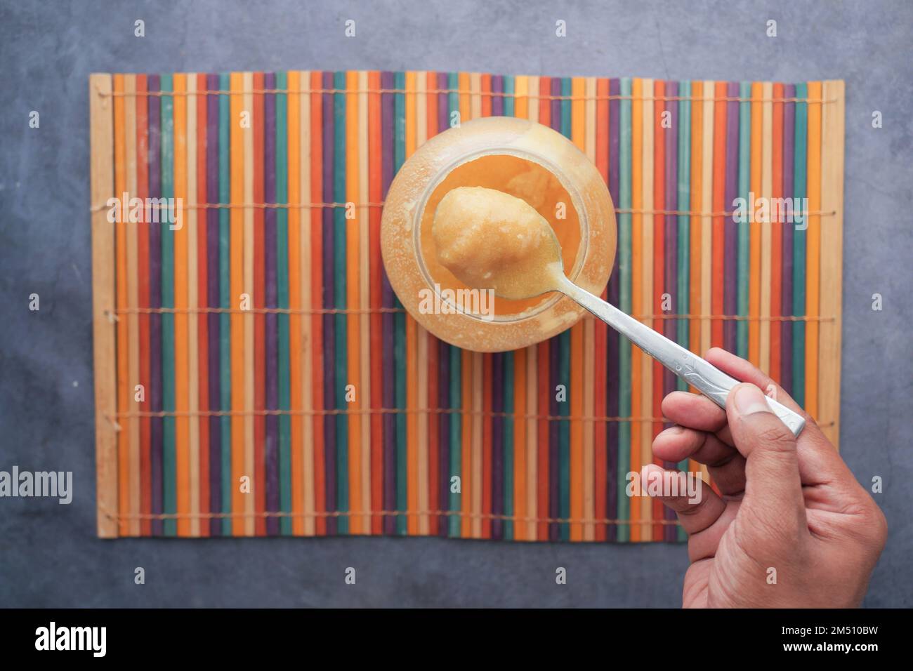 Ghee on a spoon hi-res stock photography and images - Alamy