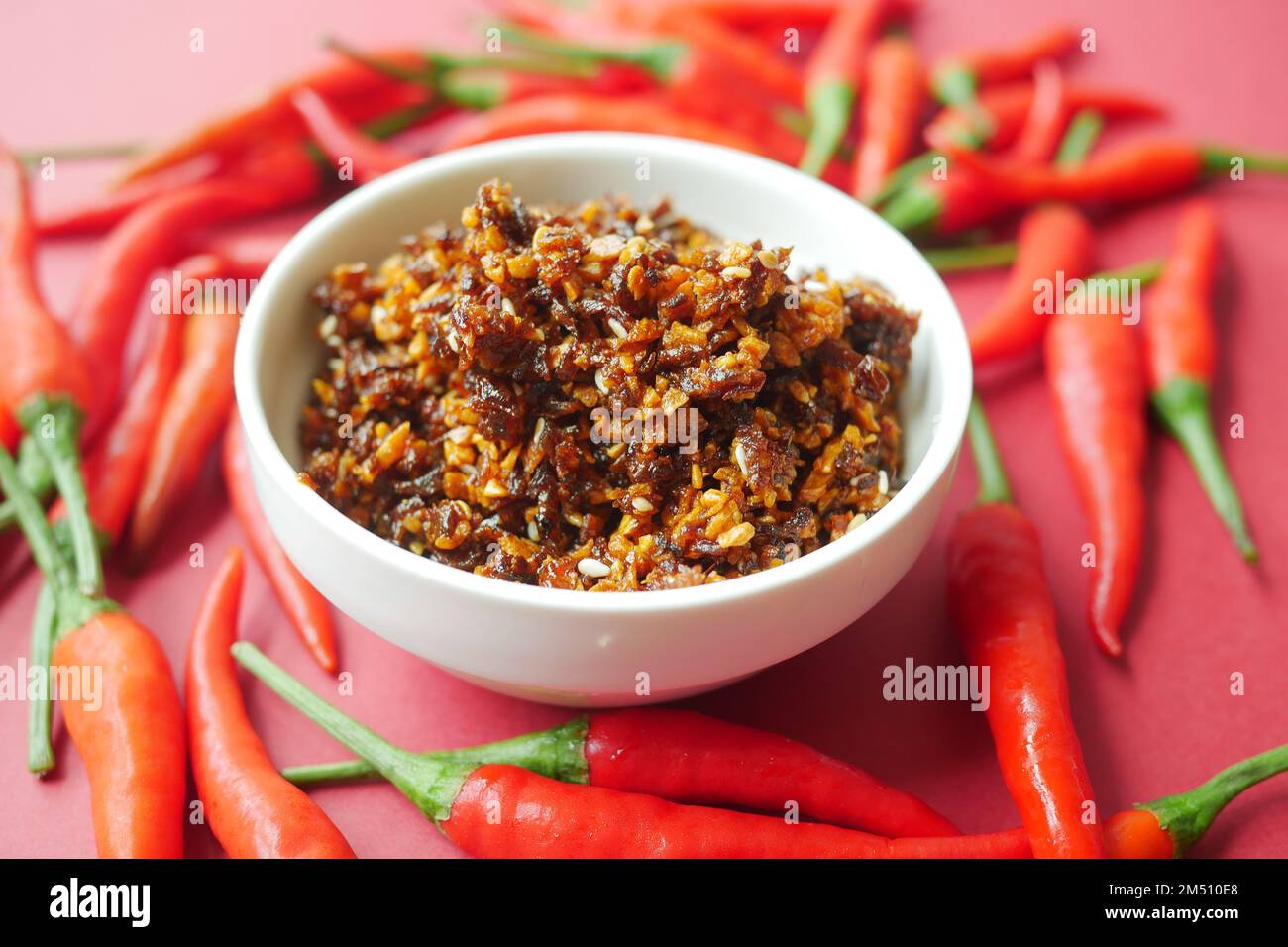 chili and garlic flakes in a container Stock Photo - Alamy