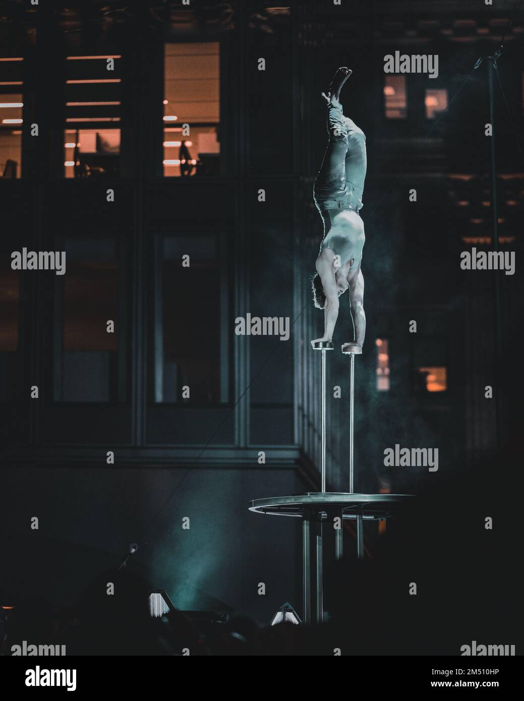 an Acrobat on two hands in place Ville Marie Montreal Stock Photo - Alamy