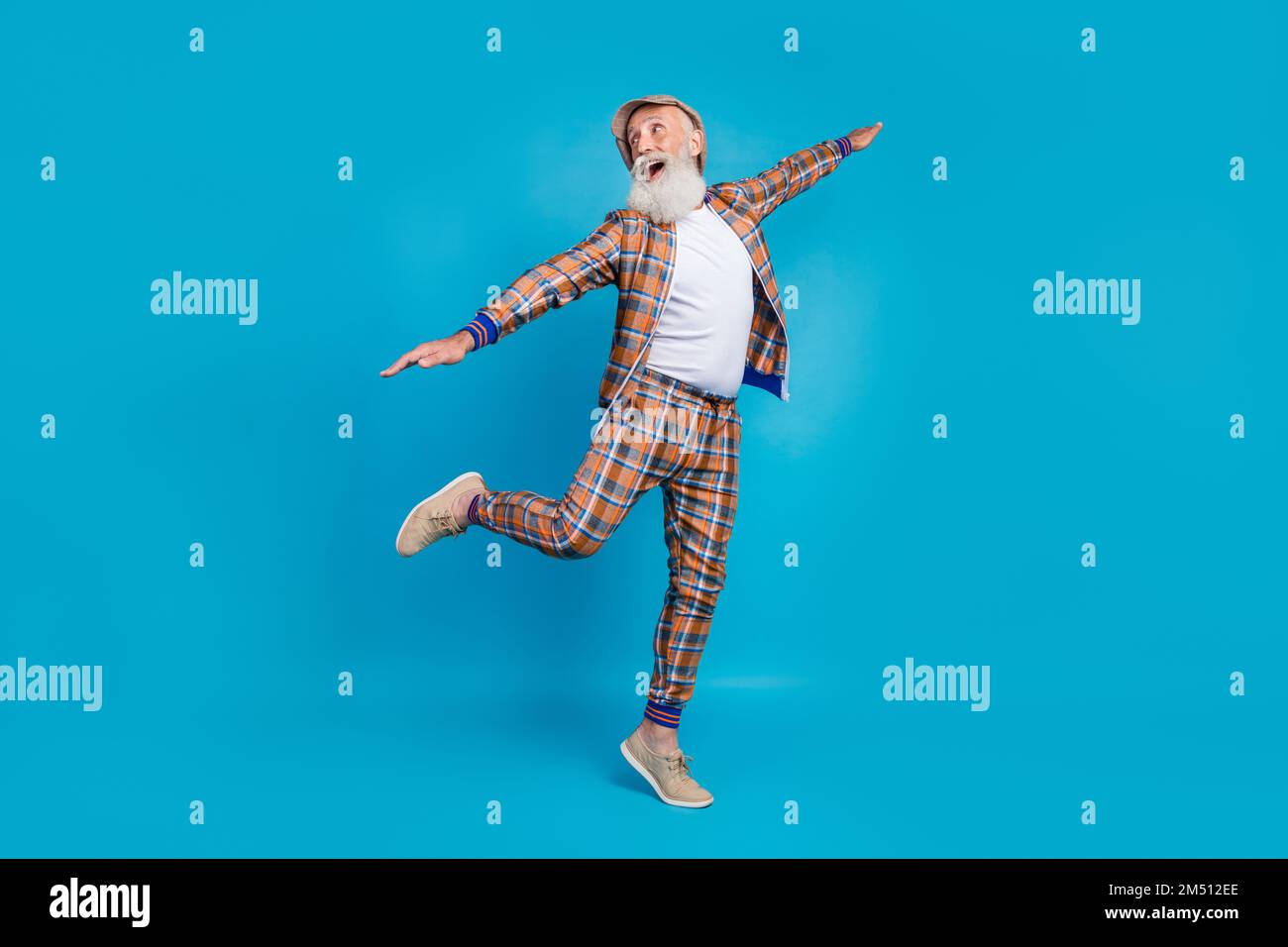 Full body portrait of overjoyed funky person arms wings stand one leg ...