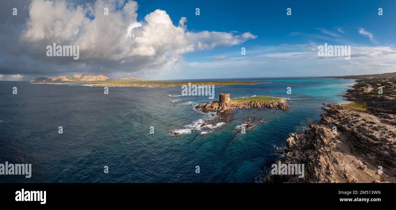 A view of the Spiaggia la Pelosa with the Pelosa Watchtower near ...
