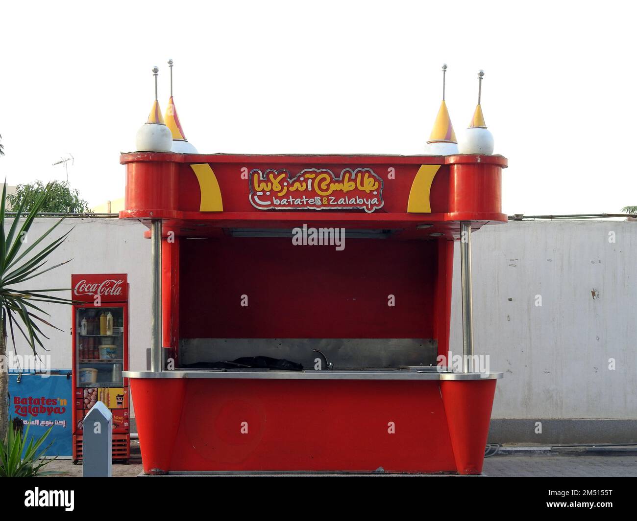 Cairo, Egypt, December 10 2022: Batates and Zalabya or potatoes and ...