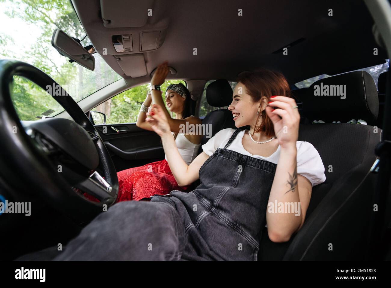 Diverse people inside a car hi-res stock photography and images - Alamy