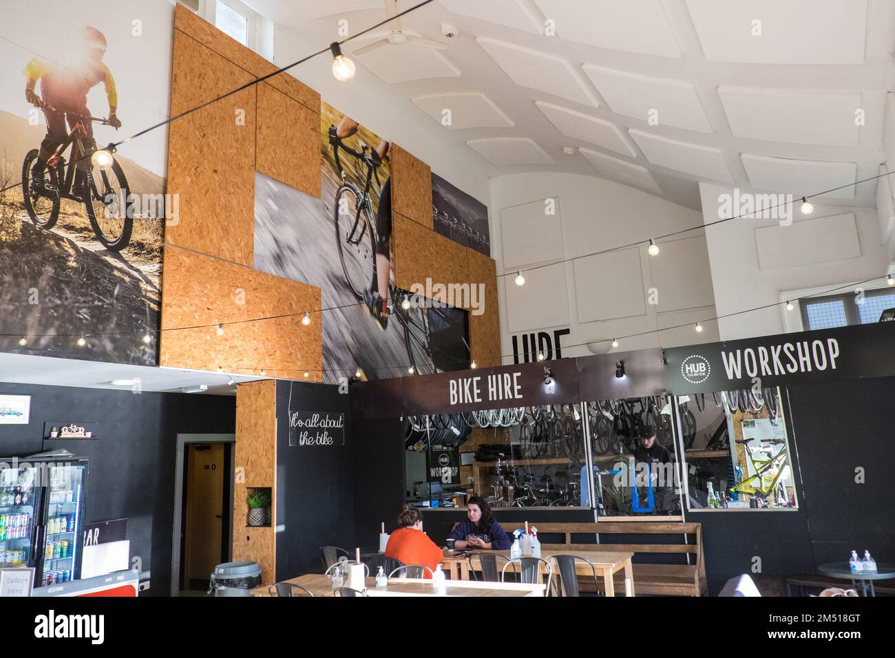 Modern bicycle and accessories shop with repair hi-res stock ...