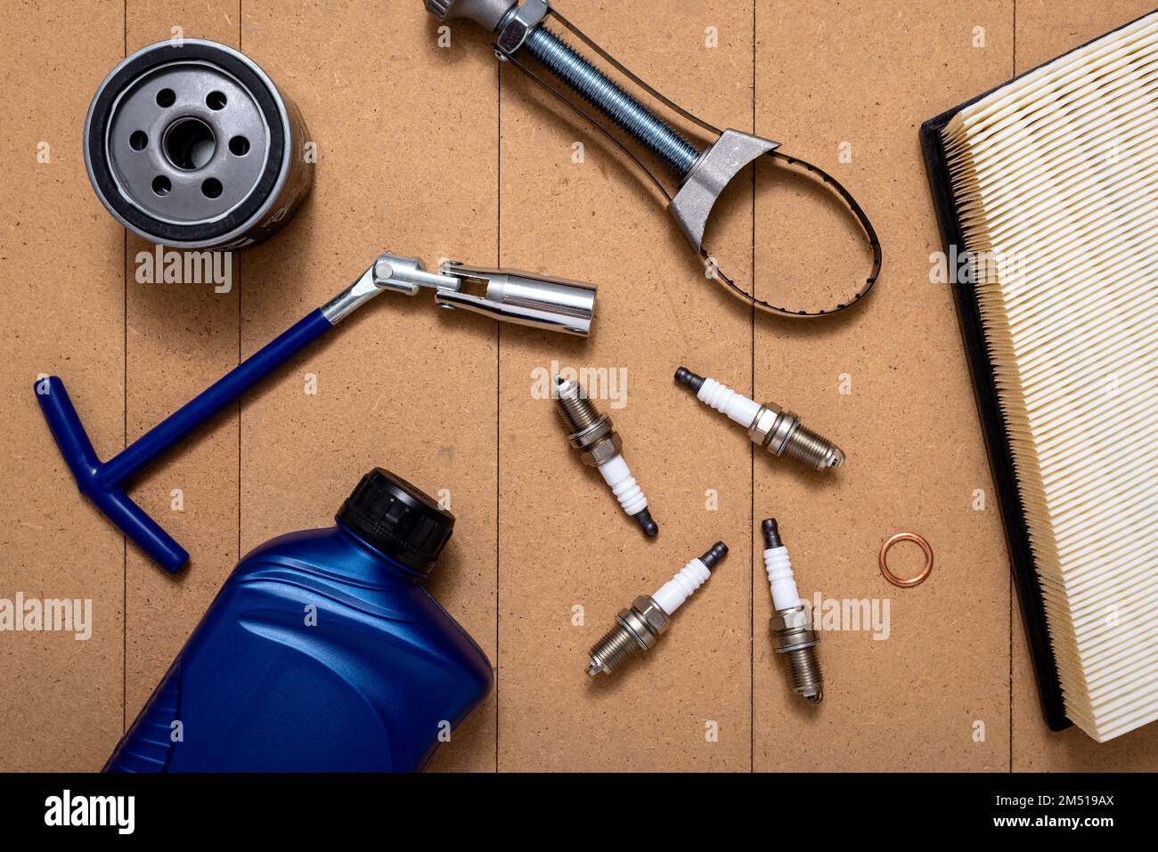 Bottle of motor oil, oil filter, air filter, sparking plugs, spark plug ...