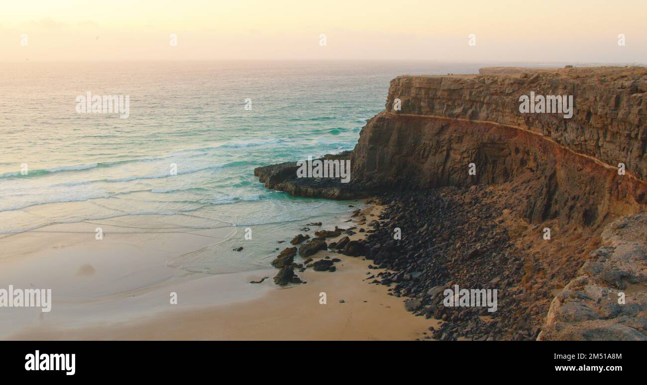 Beautiful landscape with sandstone rocky cliffs over the sea surface at ...
