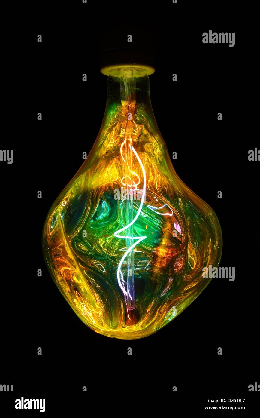 A vertical closeup shot of the beautiful, creative light bulb isolated ...