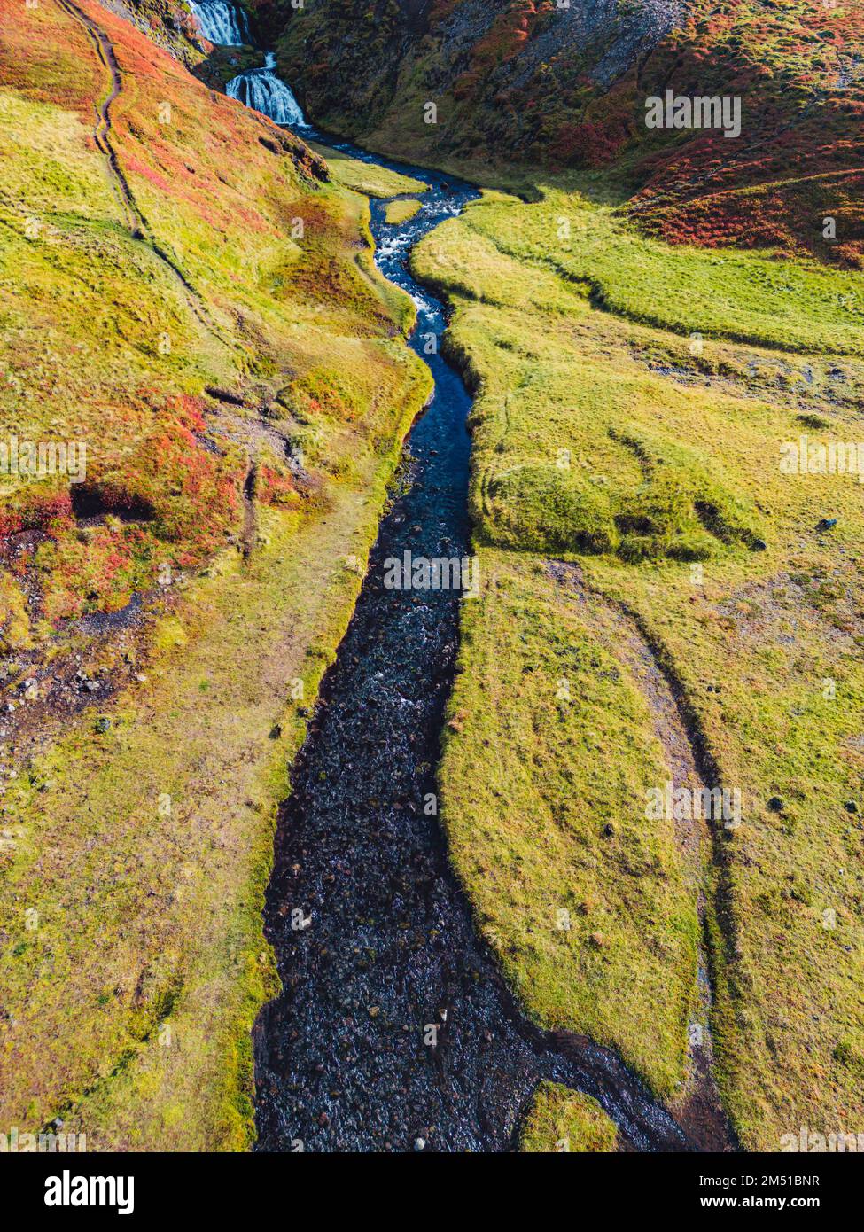 Small stream coming down from the waterfall - Iceland Stock Photo - Alamy