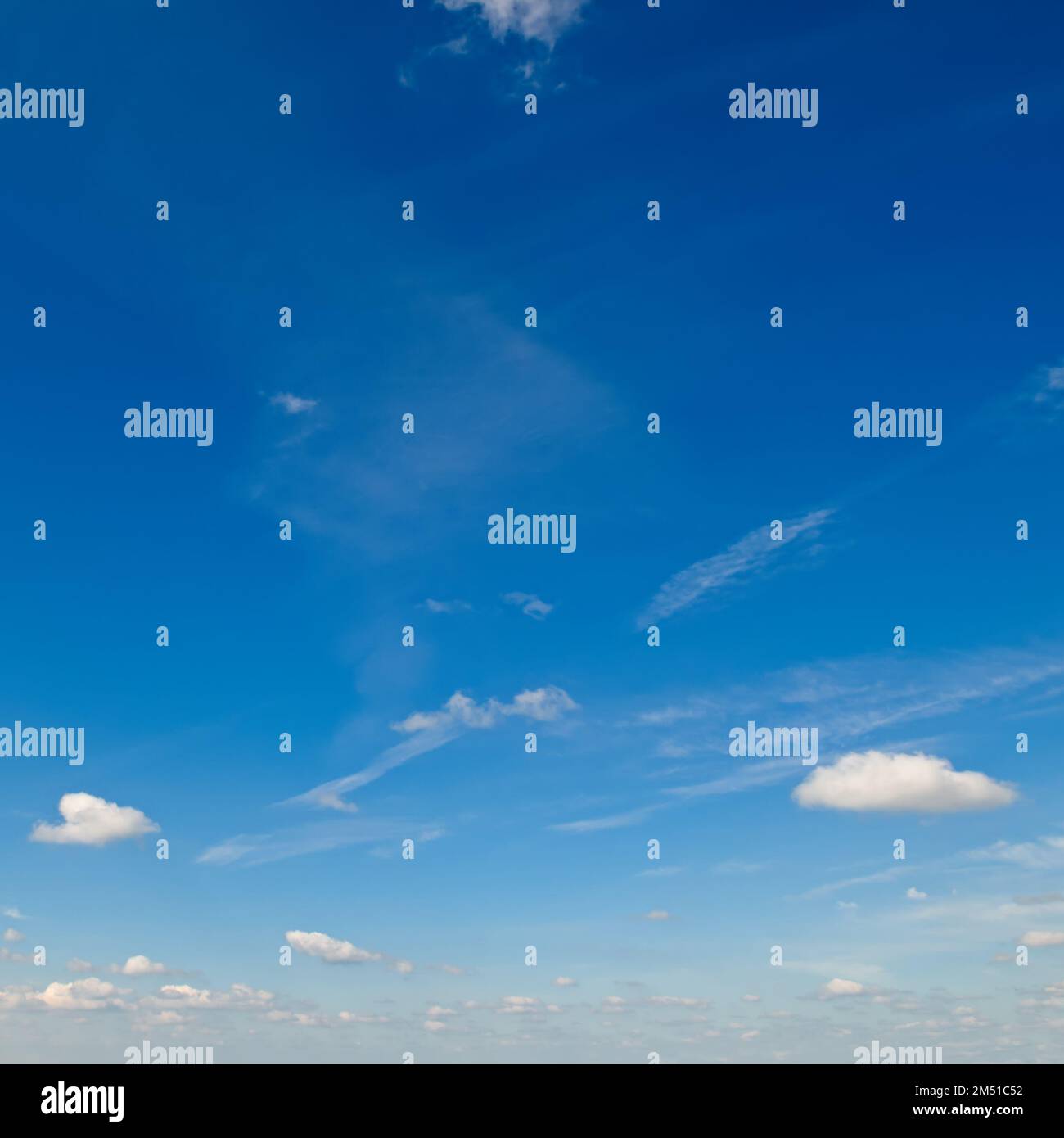Blue sky and light cumulus clouds Stock Photo - Alamy