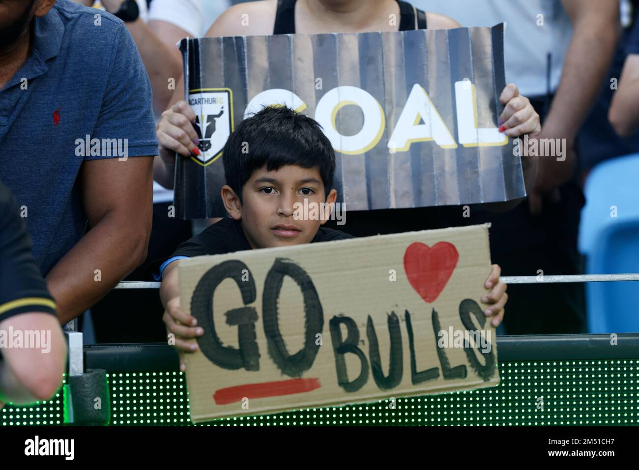 A young Macarthur FC supporter celebrating the win after the match ...