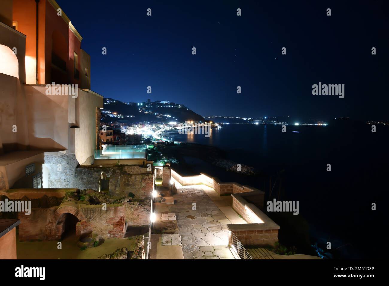 Ruins of an ancient Roman city on the seafront of Pozzuoli overlooking ...