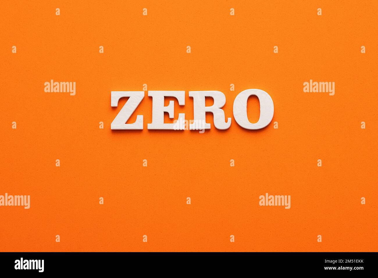 Zero phrase in white letters on orange foamy background Stock Photo - Alamy