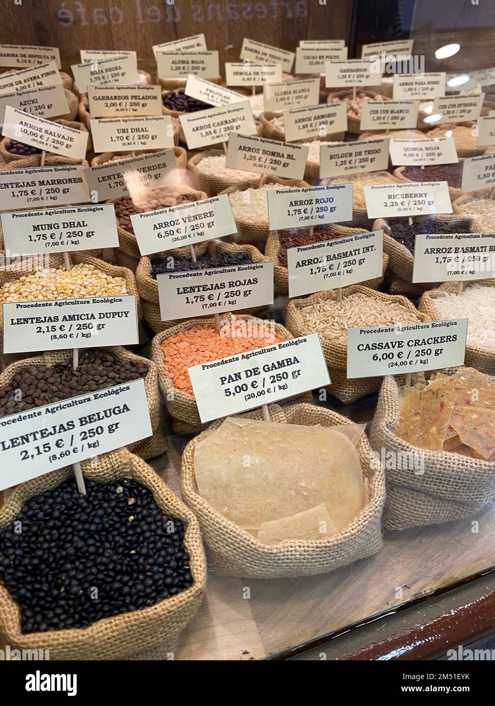 Display of labeled grains in small bags in a Mallorca, Spain food ...