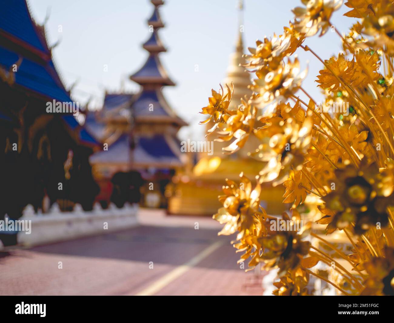 Golden iron flower bouquet at temple called "Wat Pipat Mongkol" or "The ...