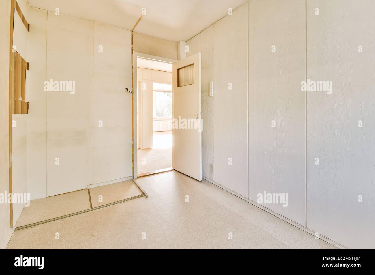 an empty room with white walls and no one person in the room to be used ...