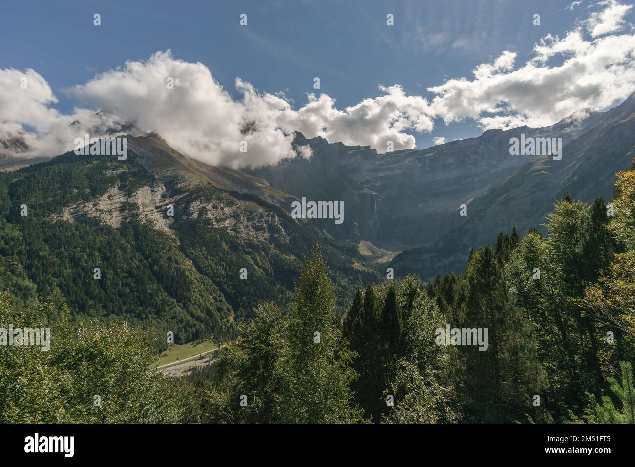 Cirque de Gavarnie with waterfall at massive high rock wall formation ...