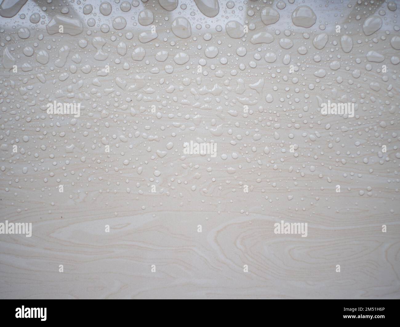 water droplets on white tiled floor Stock Photo - Alamy